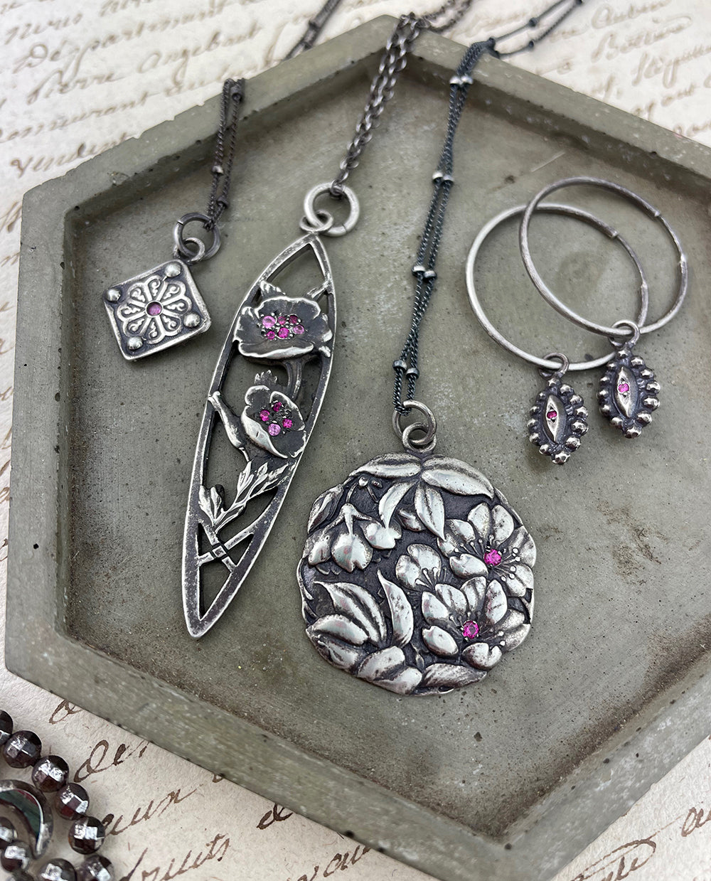 GRAVITY Necklace - Silver with Ruby – Compass Rose Design